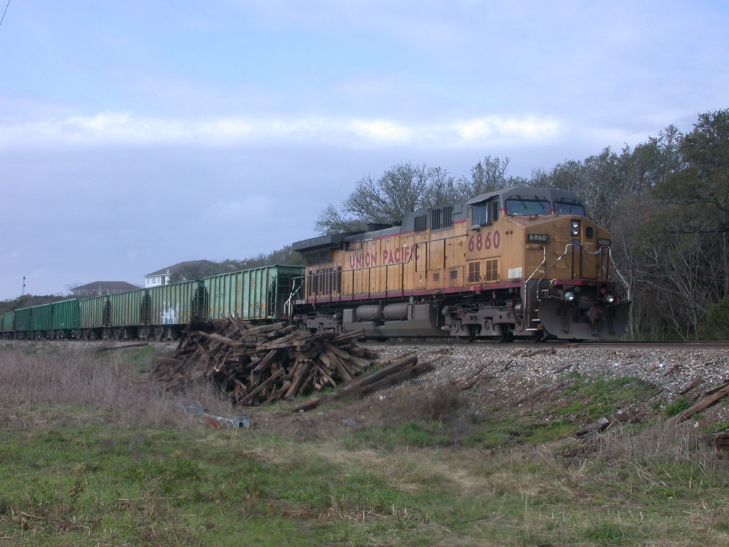 UP 6860 6Mar2010 Waiting on the side with MOW ballast NB in CENTEX